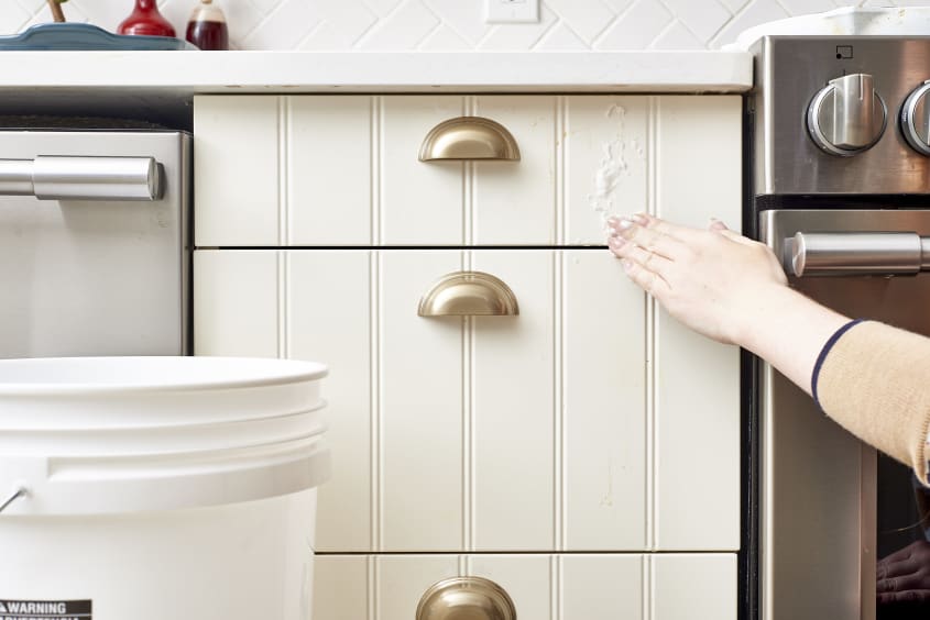 How To Get Sticky Cooking Grease Off Cabinet Doors | The Kitchn