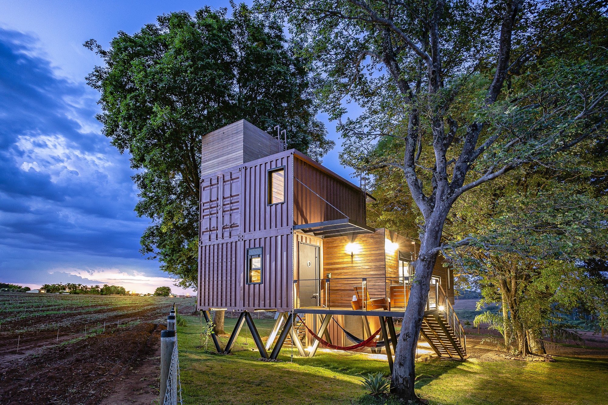 Sustainable Shipping Container House in Brazil Suspended Off the Ground ...