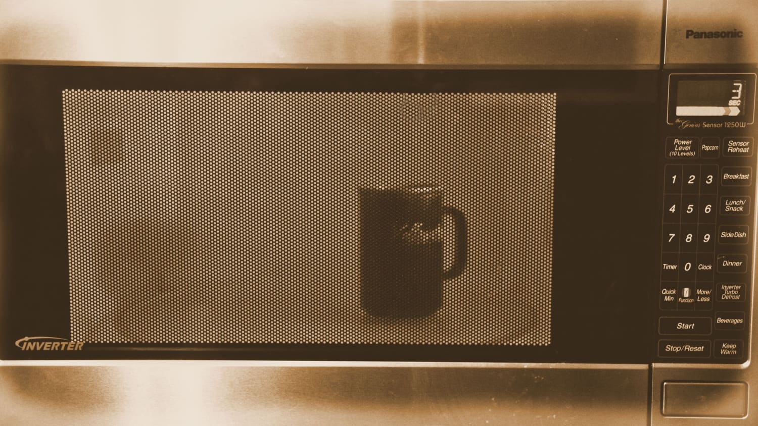 does microwaving coffee remove caffeine