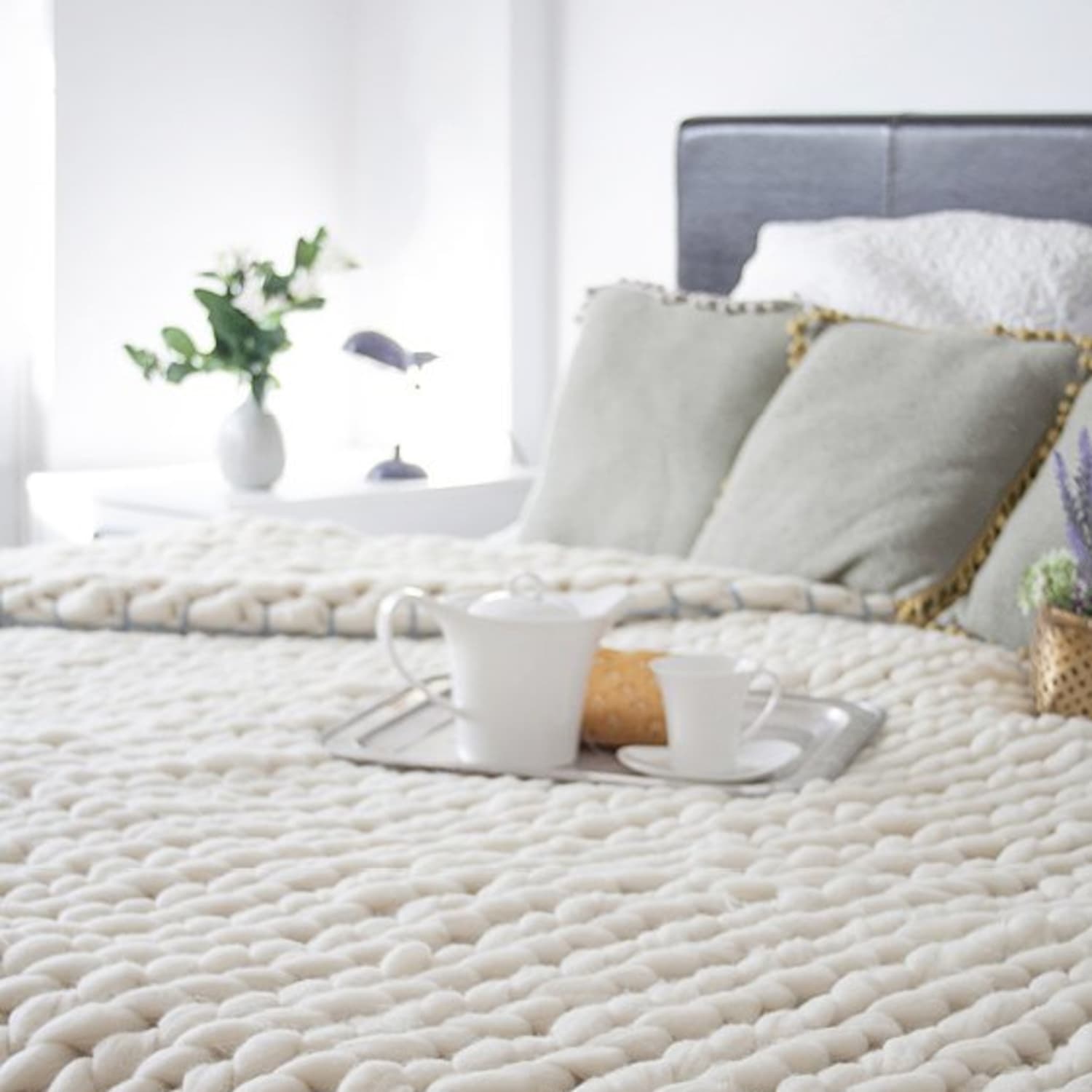 white knitted bed throw