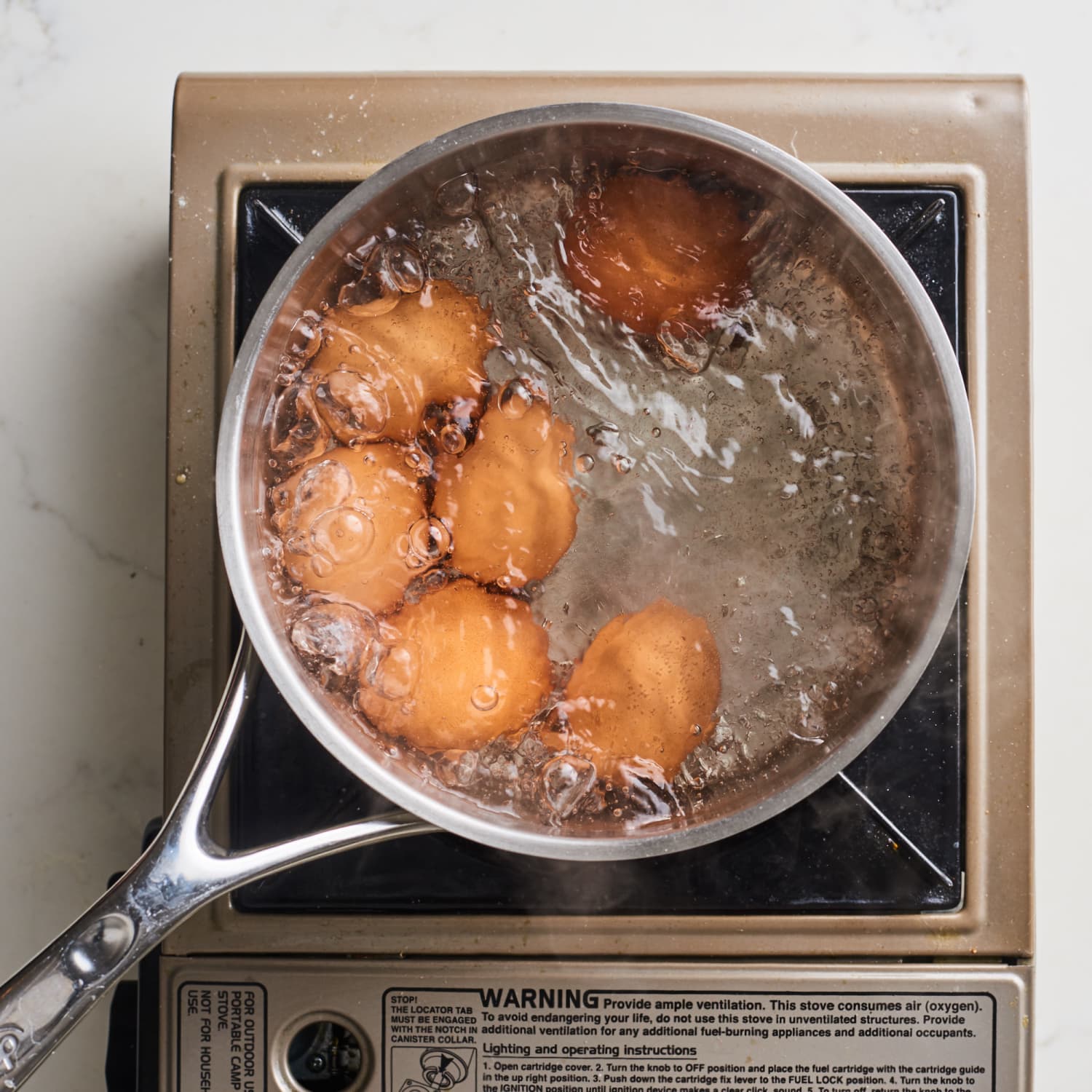 how to boil water on a hob