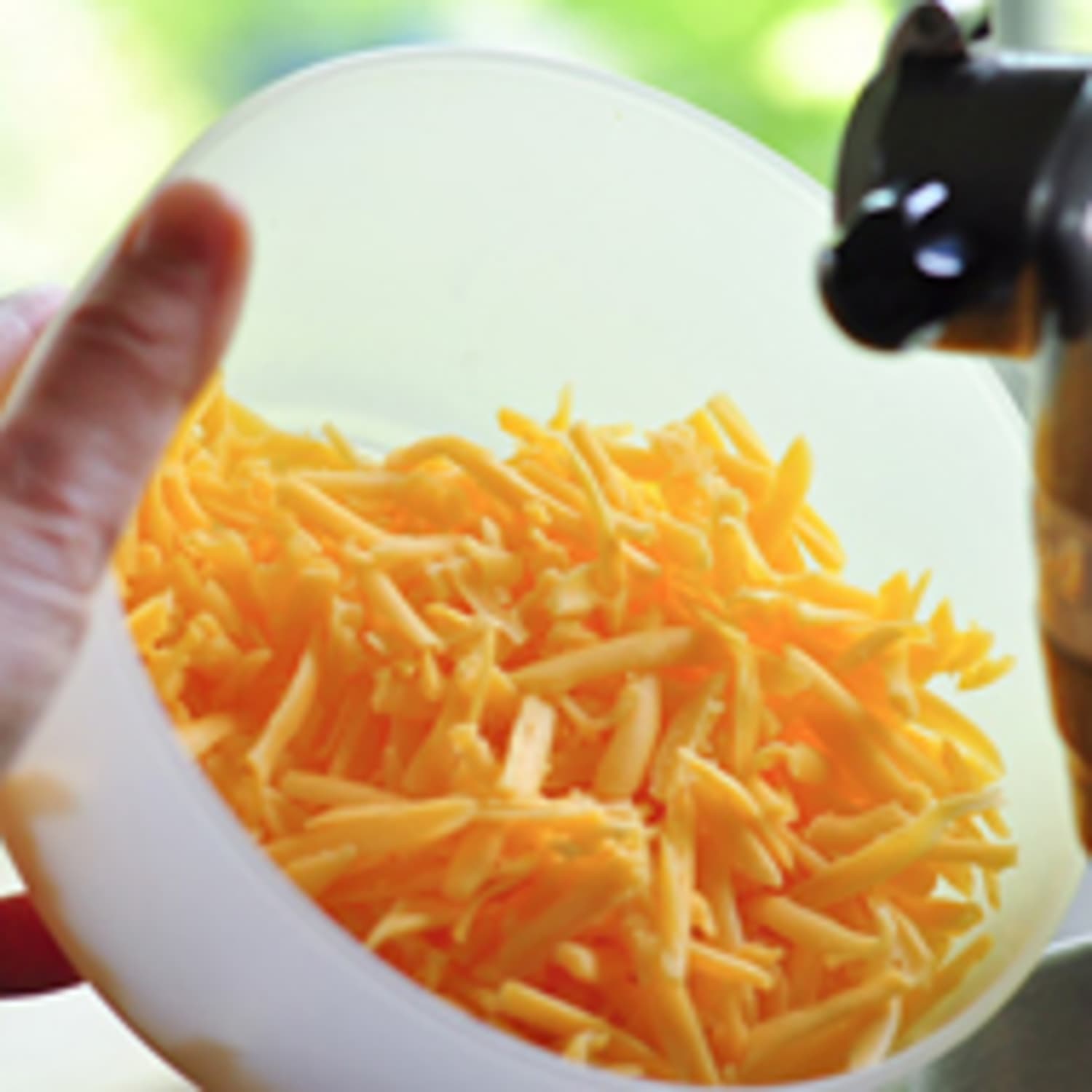 How To Grate Cheese Without A Grater : Take the block of cheese and ...