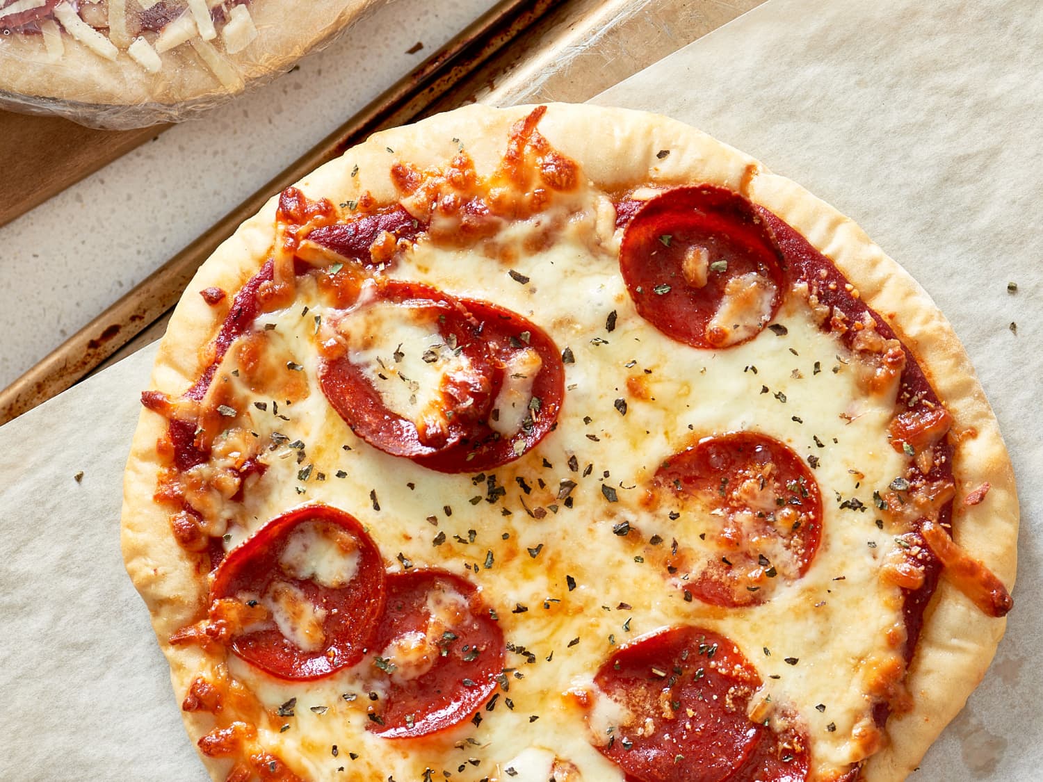 how to make a pizza round