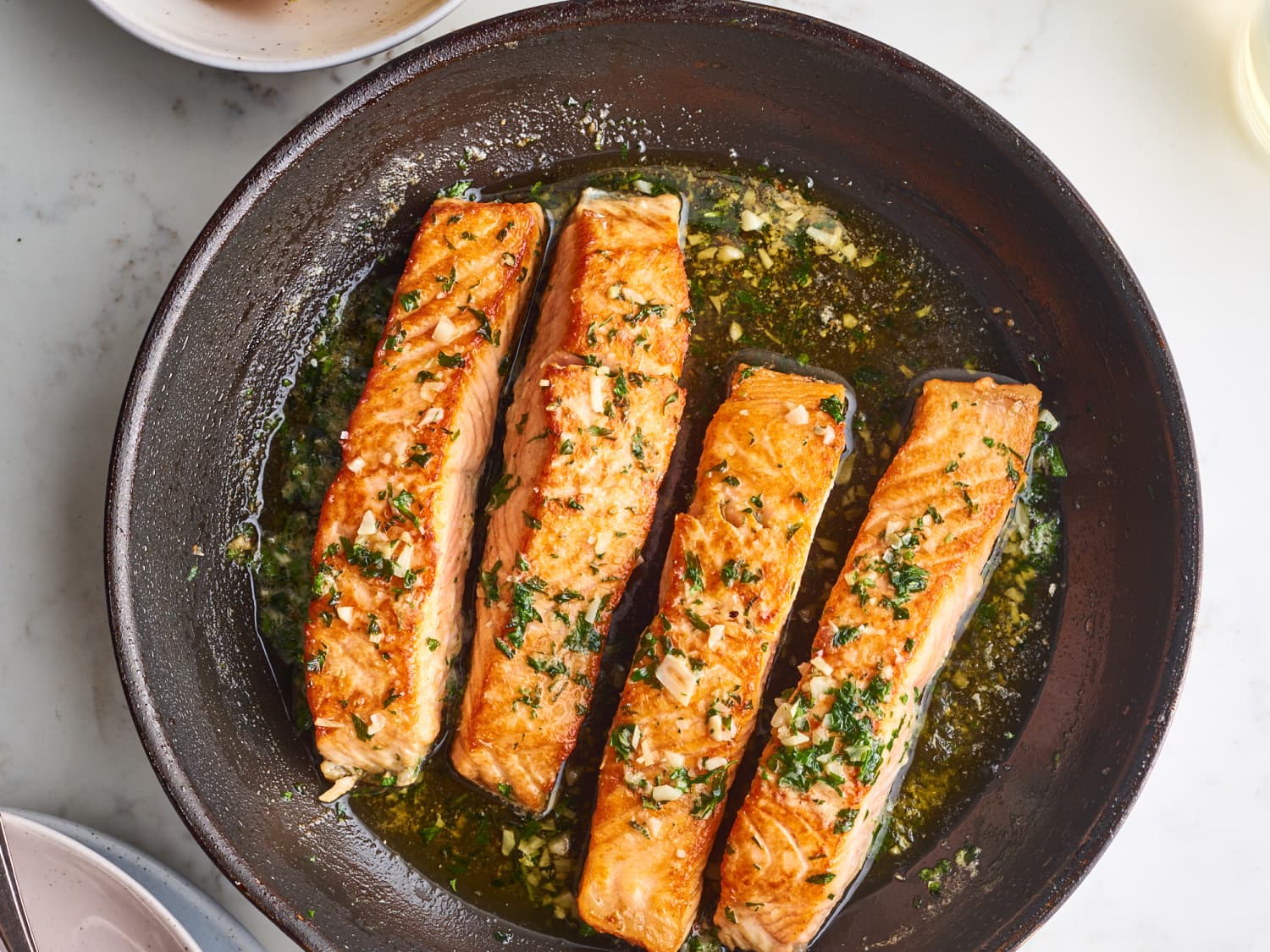 Salmon cooked in skillet store