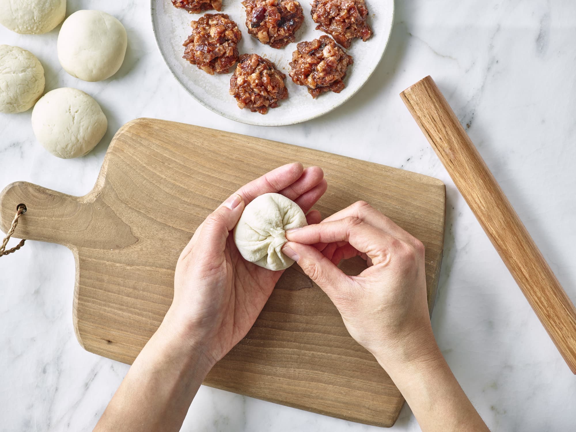 How To Make Chinese Steamed Pork Buns Char Siu Bao The Kitchn