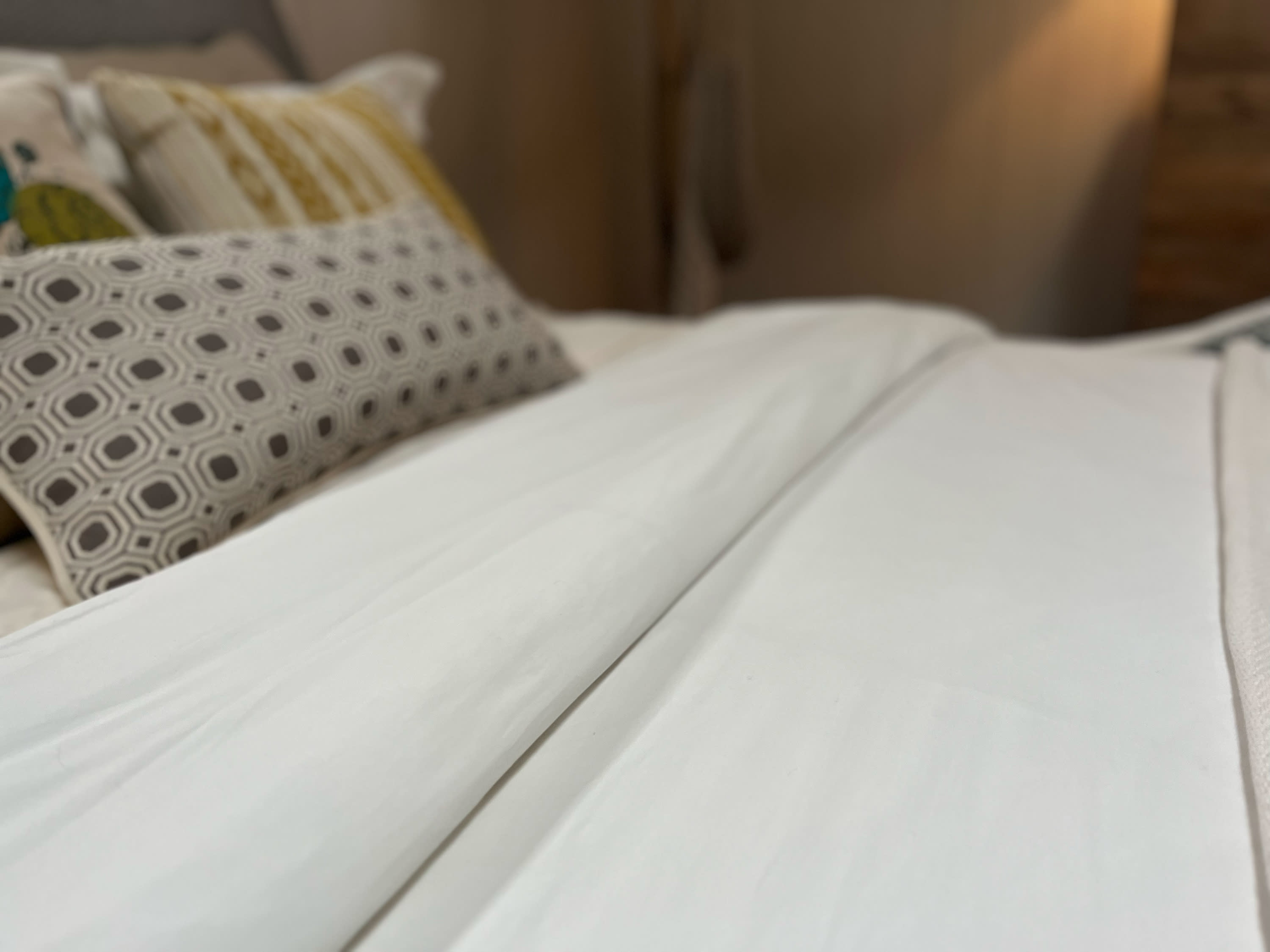 I Tried This 0 Hack to Get a Wrinkle Free Bed Without an Iron Apartment Therapy
